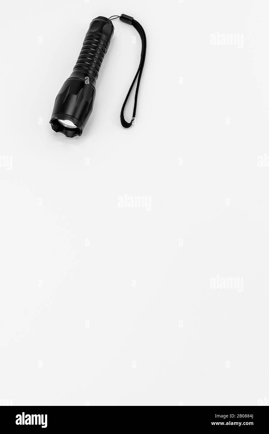 mini LED flashlight with black metallic body Stock Photo - Alamy