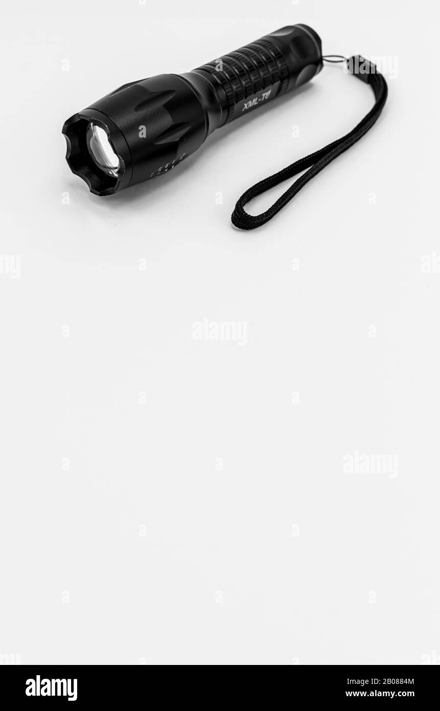 mini LED flashlight with black metallic body Stock Photo - Alamy
