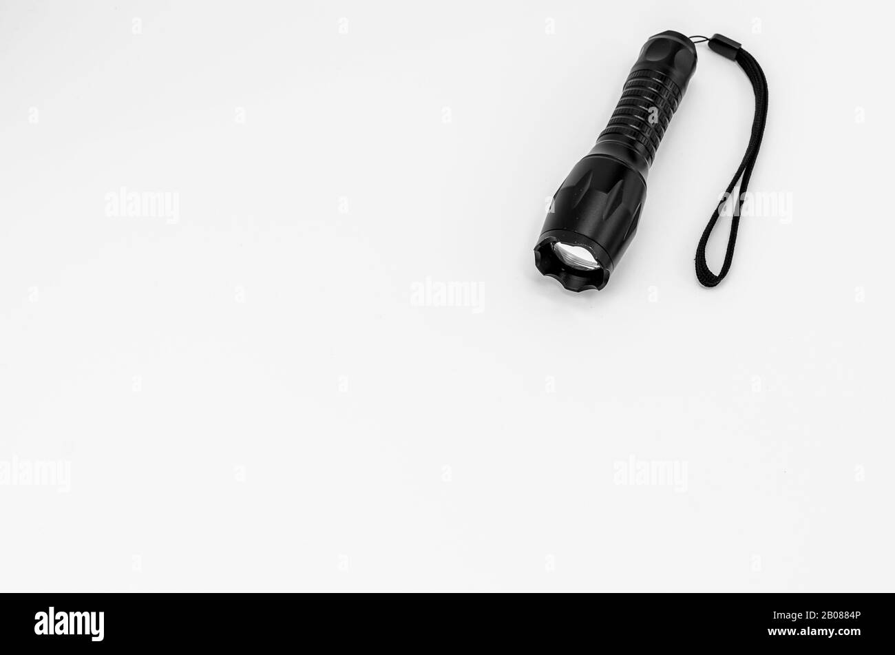 mini LED flashlight with black metallic body Stock Photo - Alamy