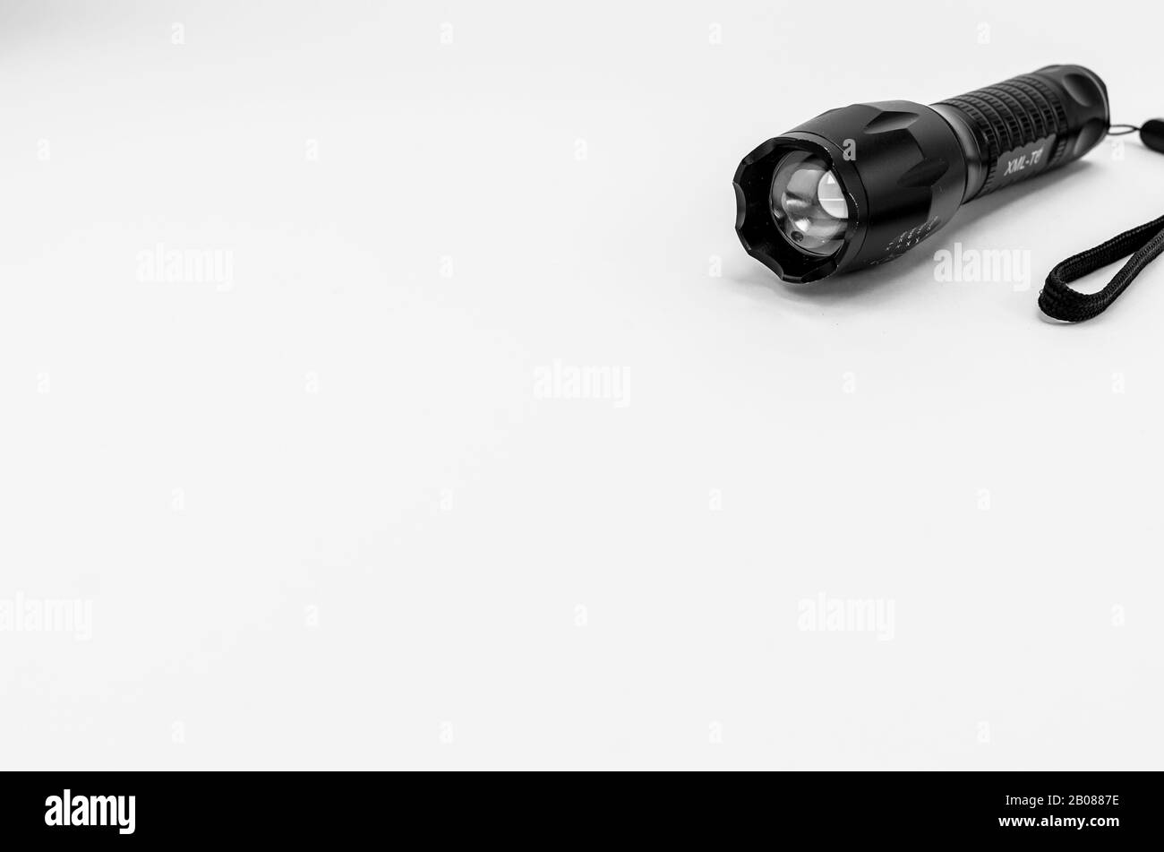 mini LED flashlight with black metallic body Stock Photo - Alamy