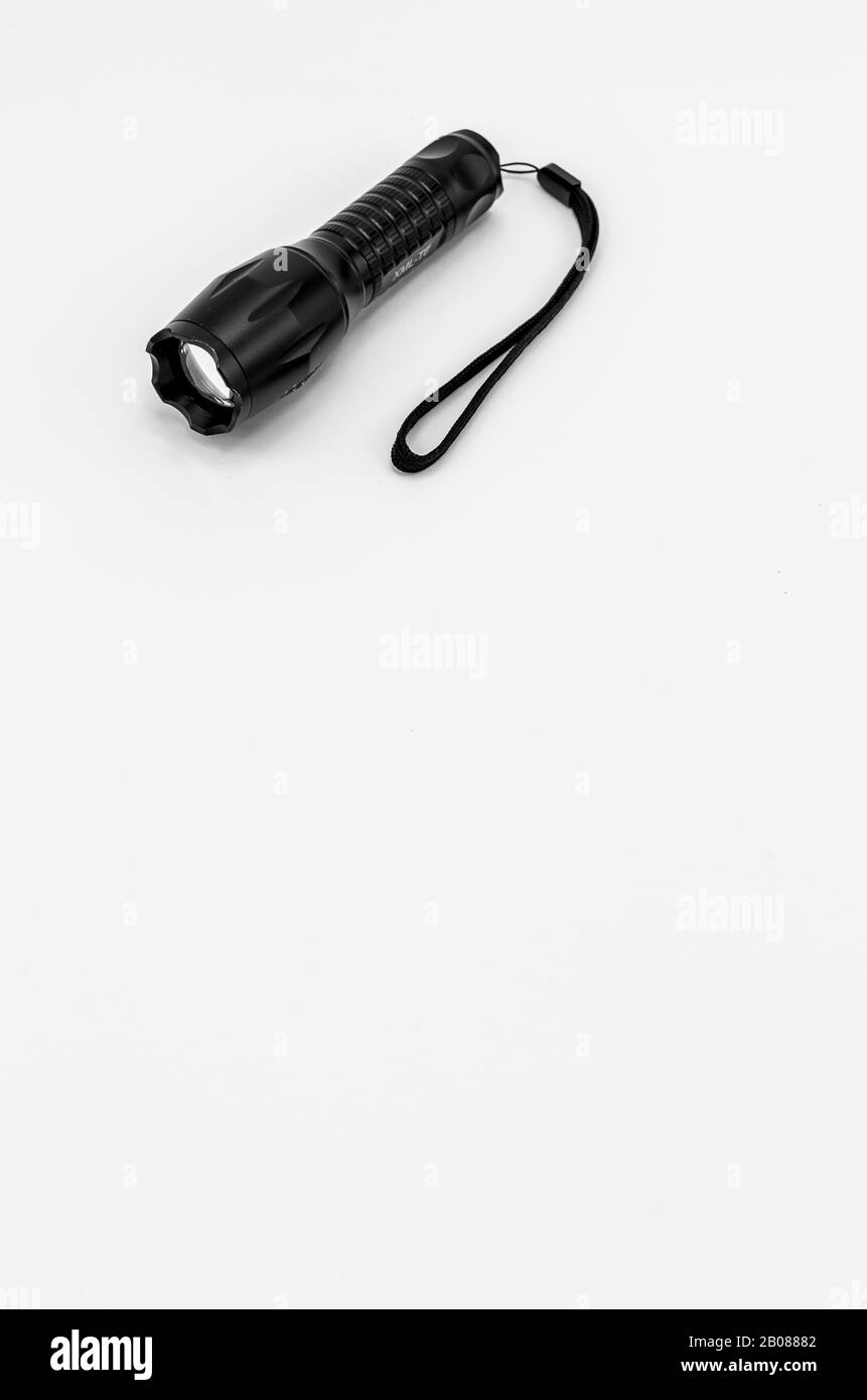 mini LED flashlight with black metallic body Stock Photo - Alamy