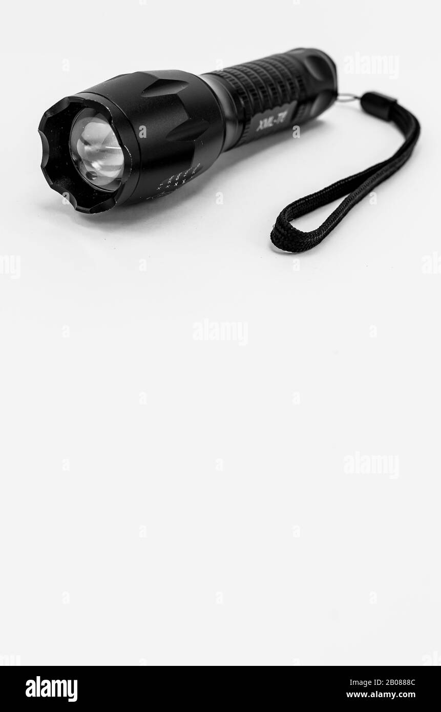 mini LED flashlight with black metallic body Stock Photo - Alamy