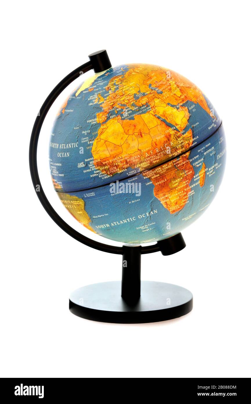 Illuminated terrestrial globe / earth sphere against white background ...