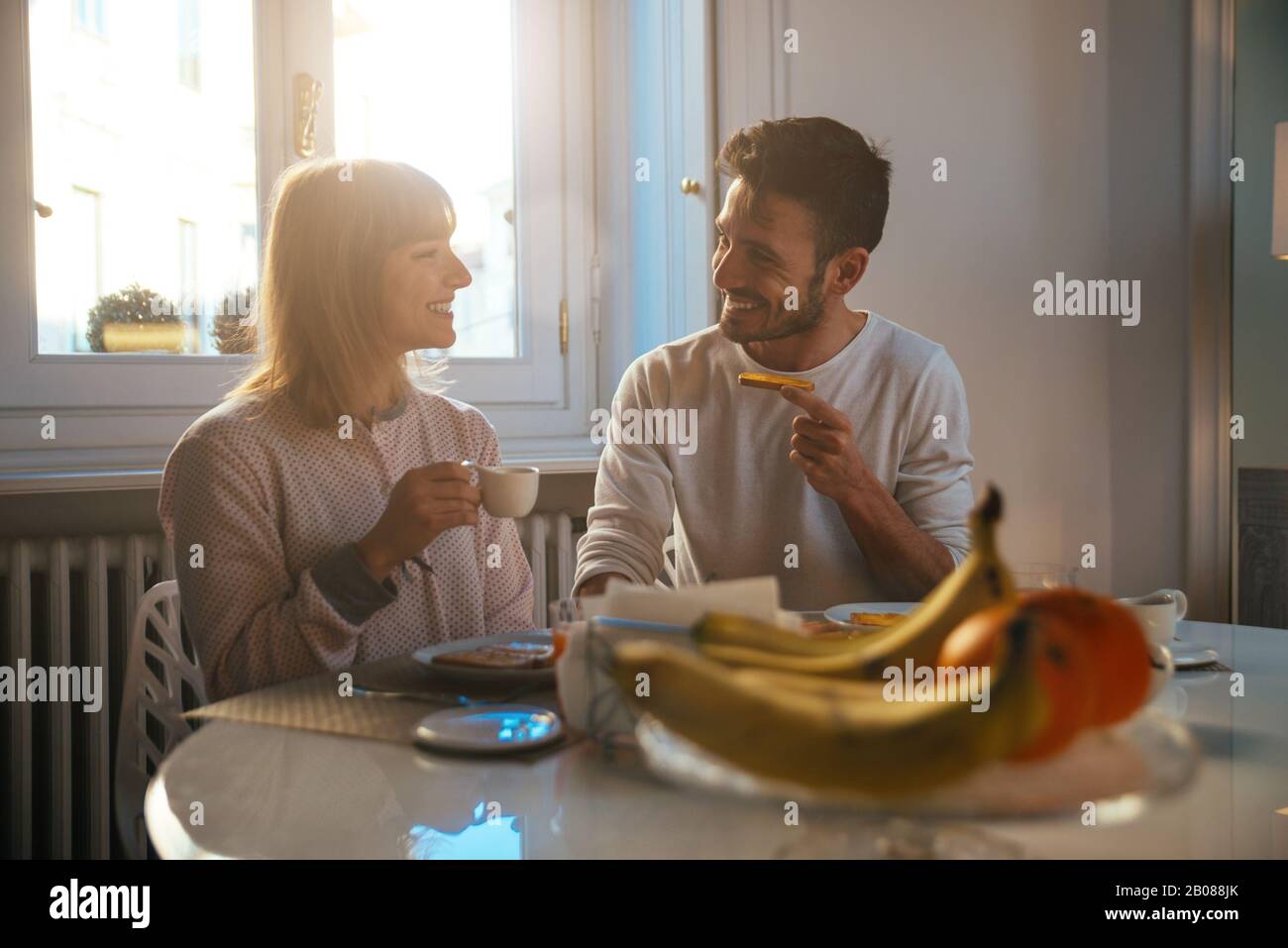 Happy couple making breakfast at home. Concept about lifestyle, healthy ...