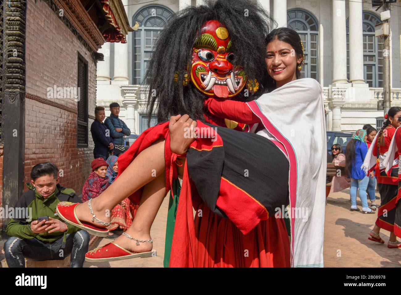 Kathmandu, Nepal - 1 February 2020: woman with a traditional mask at ...