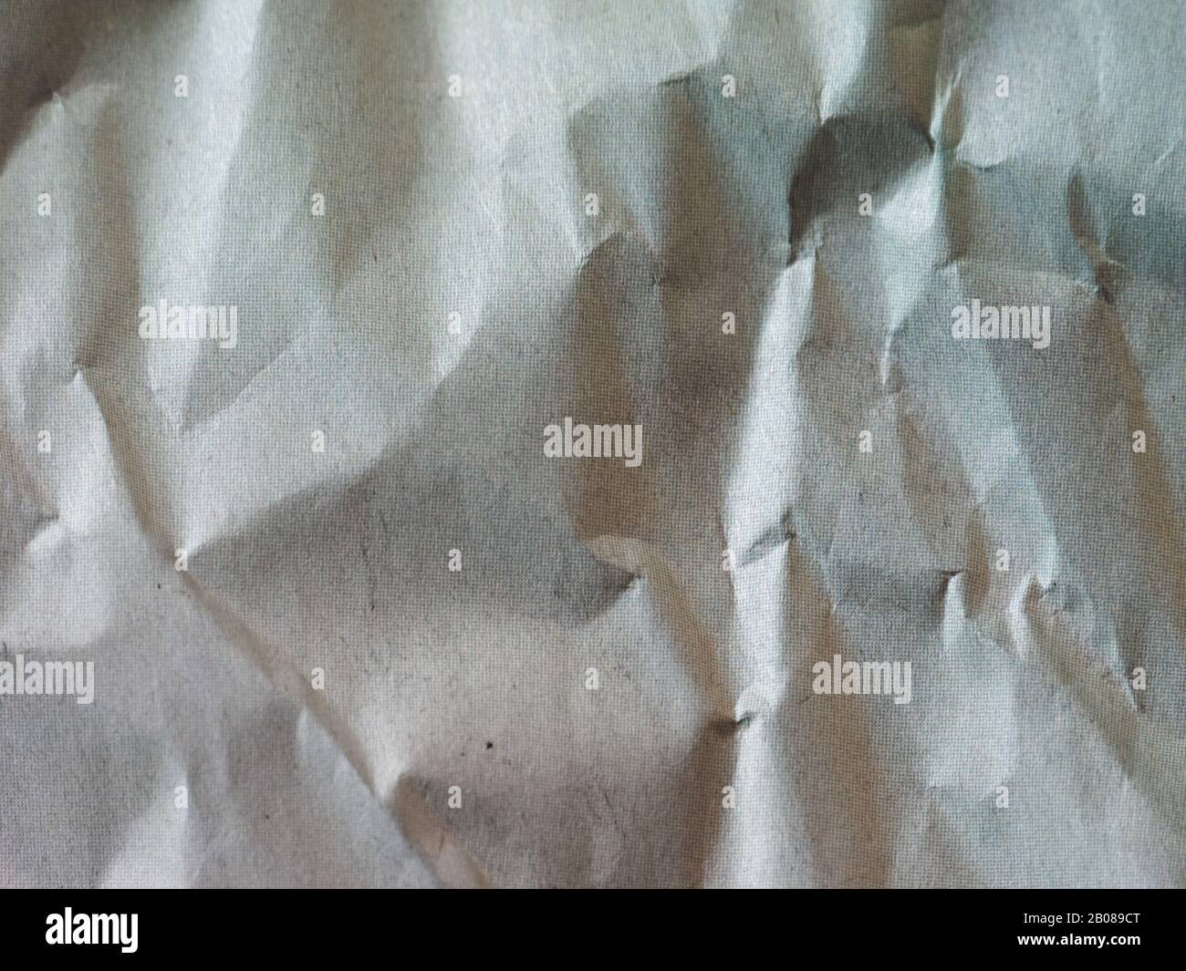 green crinkled paper texture useful as a background Stock Photo - Alamy