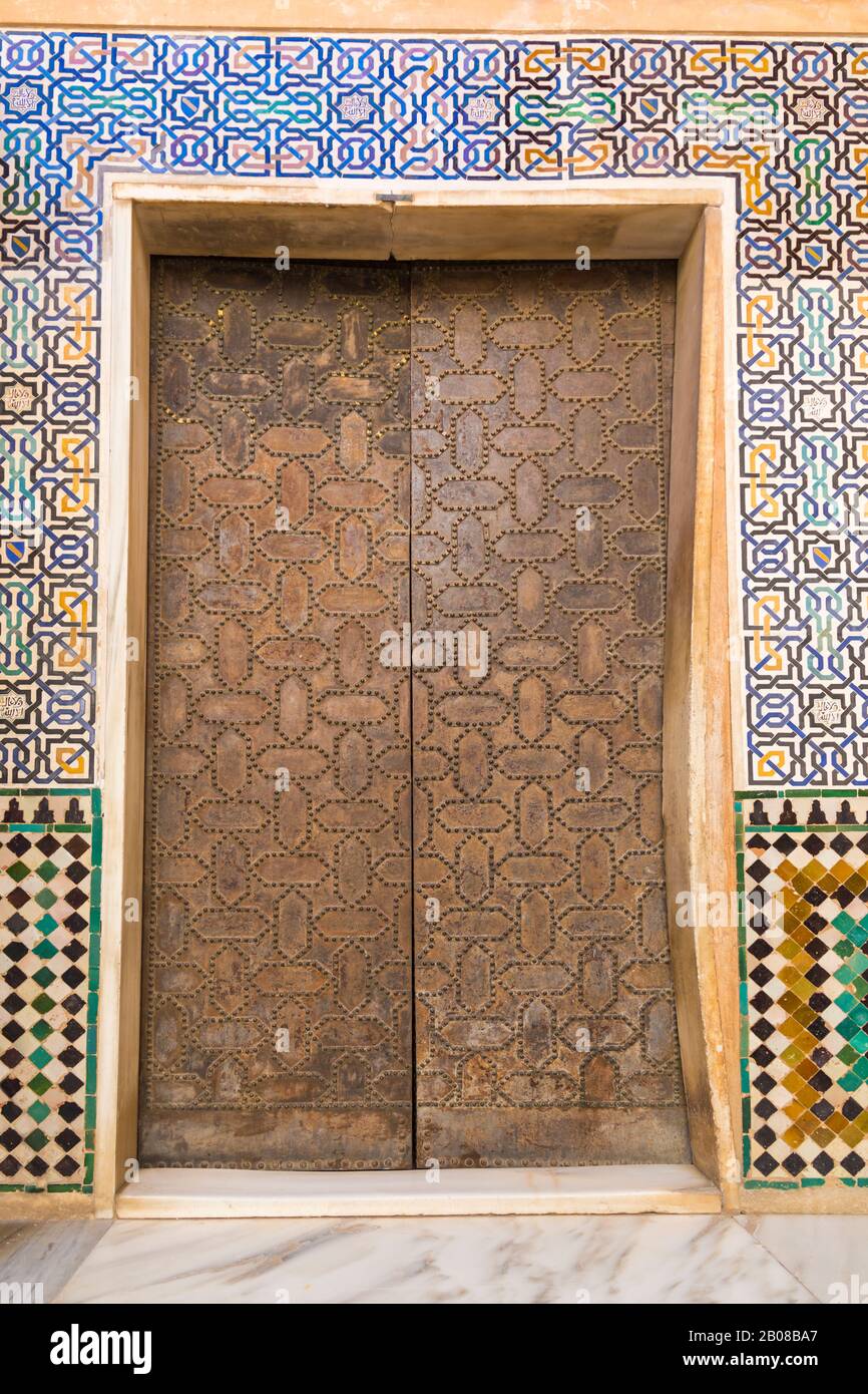 detail of Alhambra tiles on mosaic wall and door in the Courtyard of ...