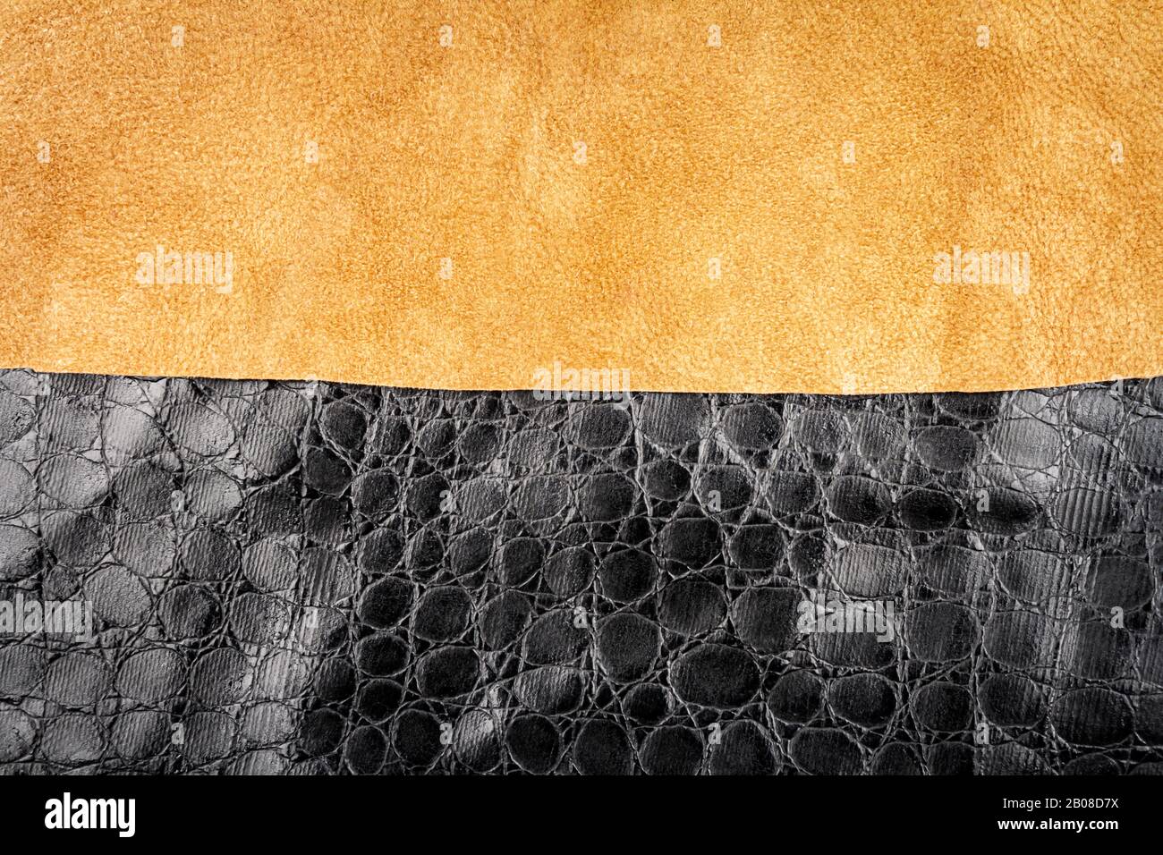 Brown leather and black artificial alligator skin textures background ...