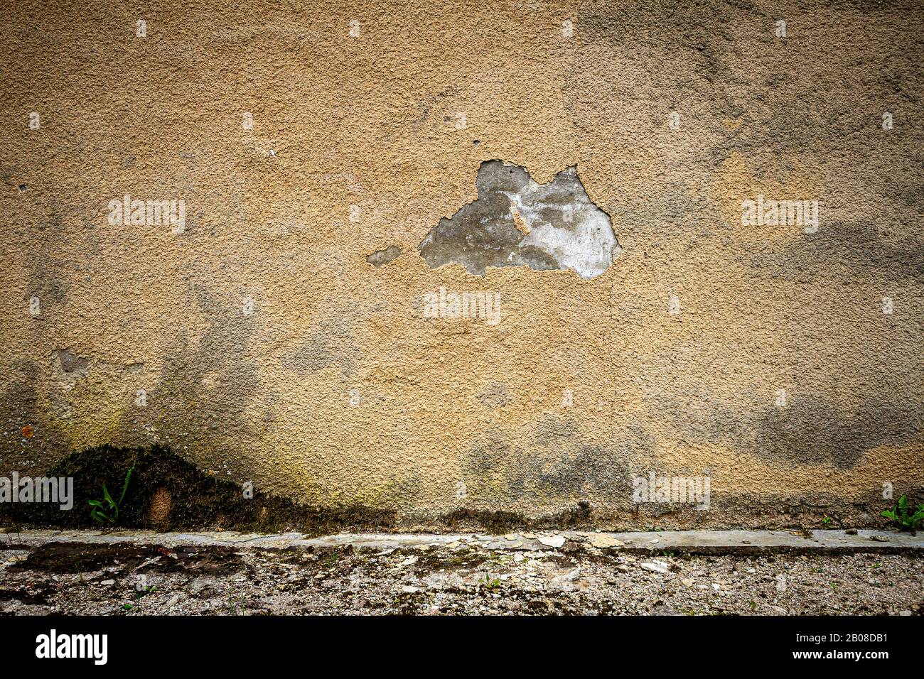 Old weathered wall of plaster and a ground Stock Photo - Alamy