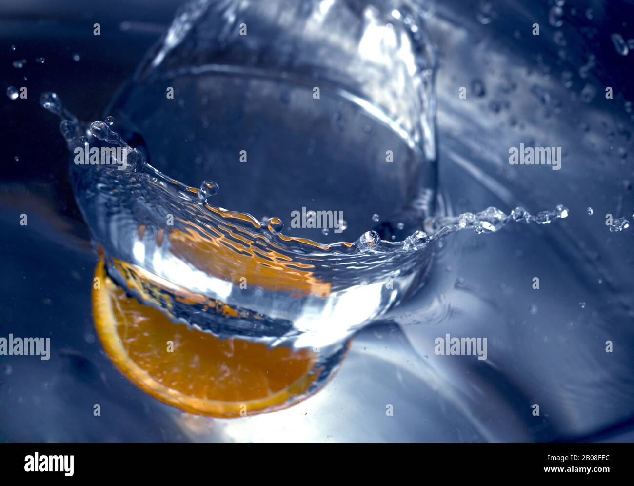 Orange citrus, dropped to the water, splash, underwater, drink ...