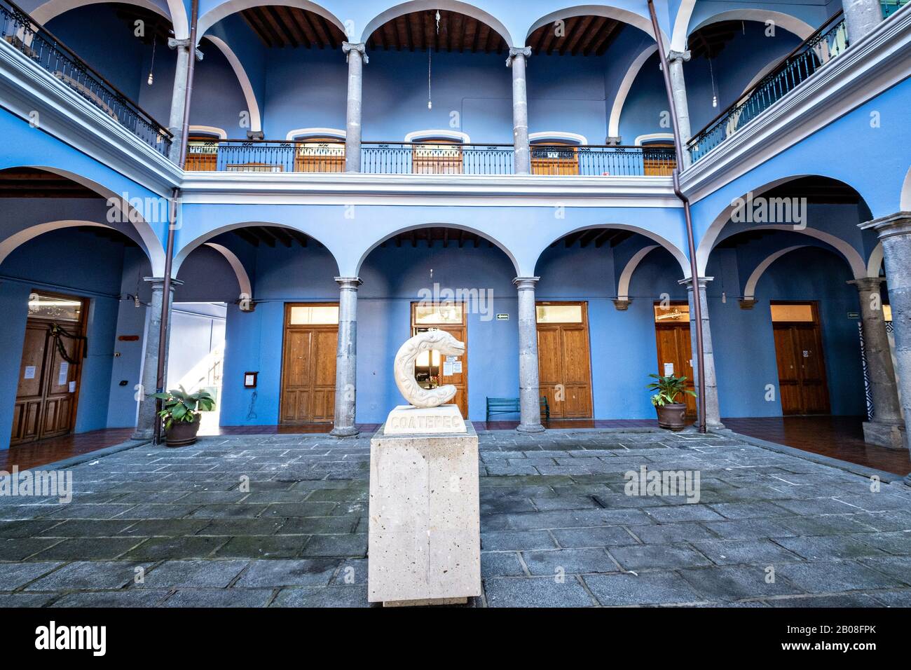 The city symbol of a snake in the colonial style City Hall courtyard in ...
