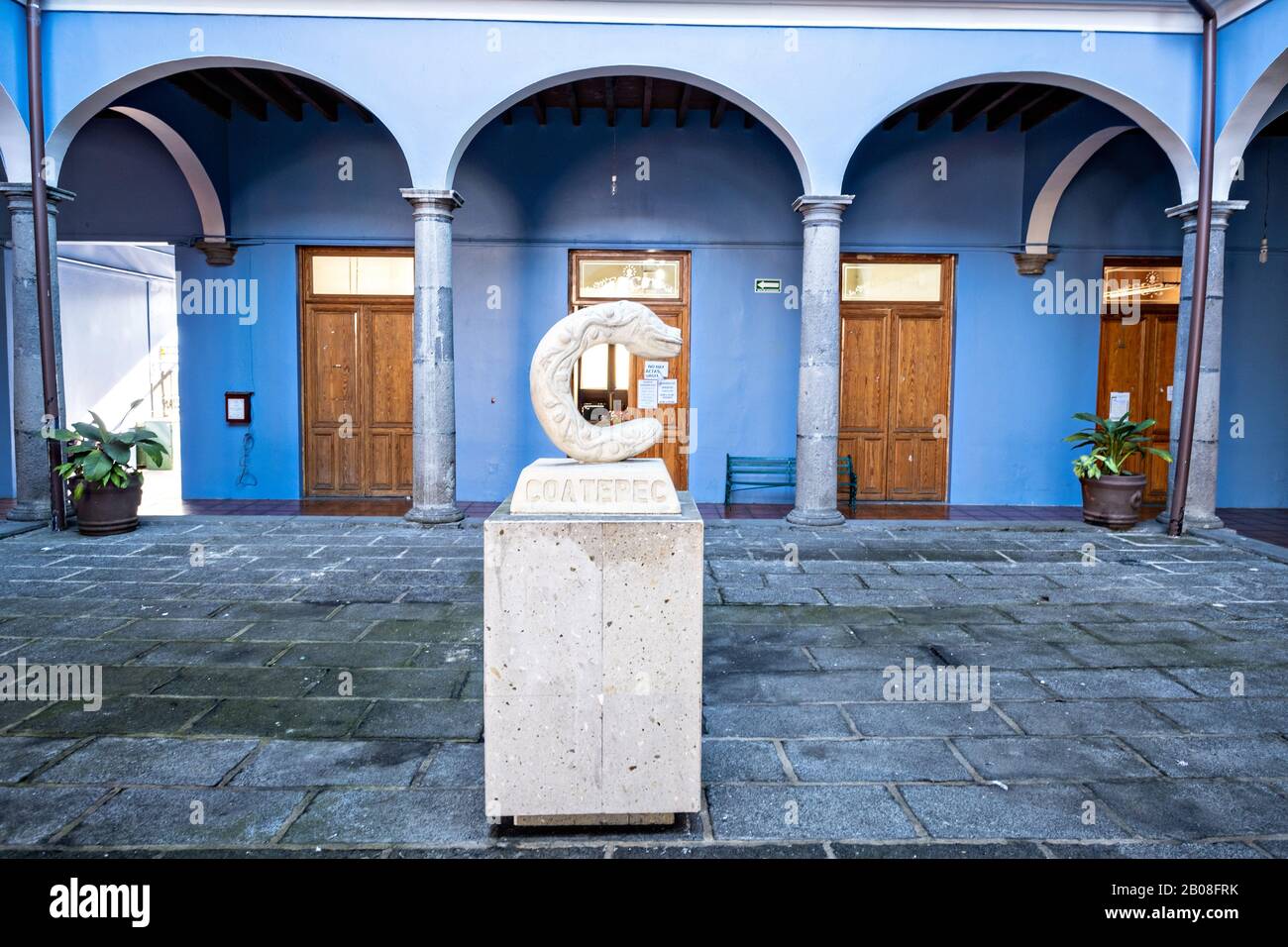 The city symbol of a snake in the colonial style City Hall courtyard in ...