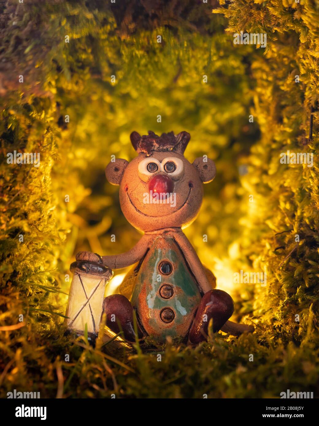 Cute character of a lightning bug sitting in his illuminated home made ...