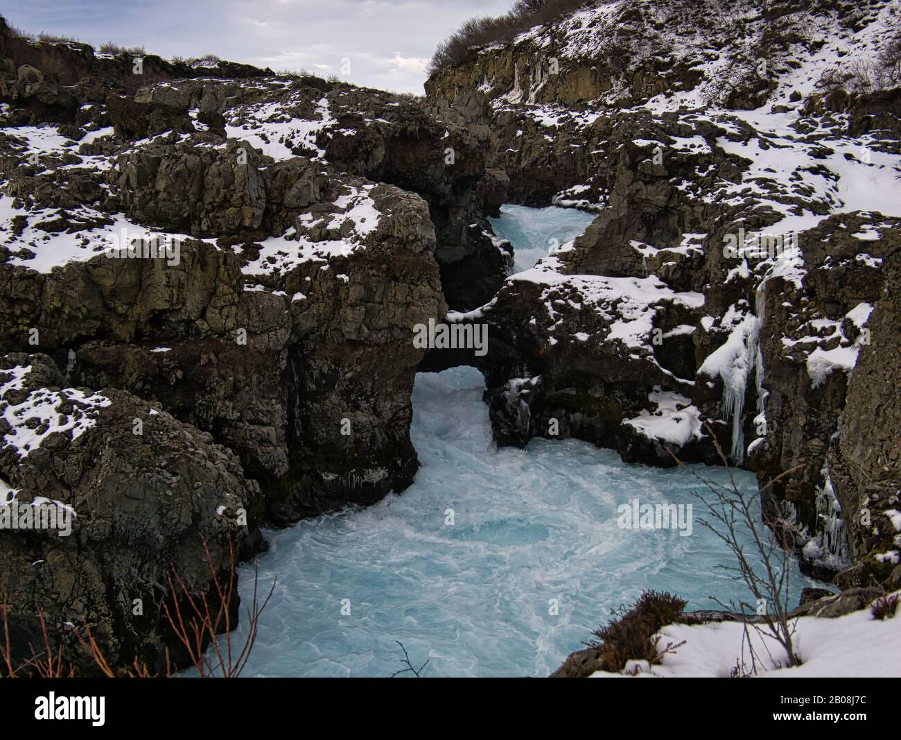 The snowy gorge of Barnafoss Waterfall in Iceland Stock Photo - Alamy