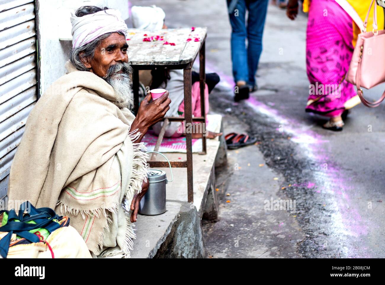 Pushkar,Rajasthan /India. 06 /11/2019. Indian Beggar Taking a cup of ...
