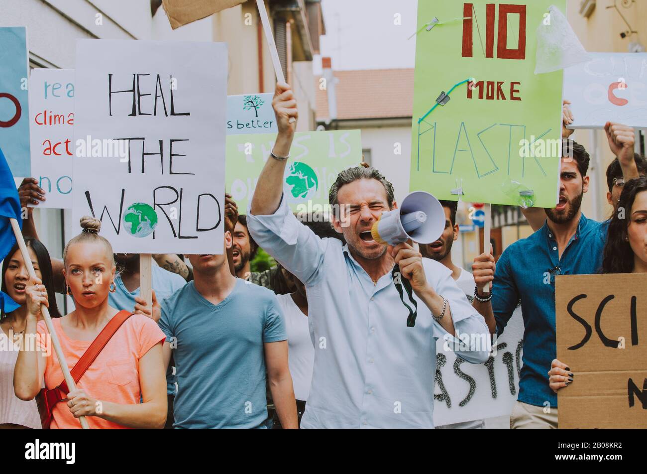 Public demonstration on the street against global warming and pollution ...
