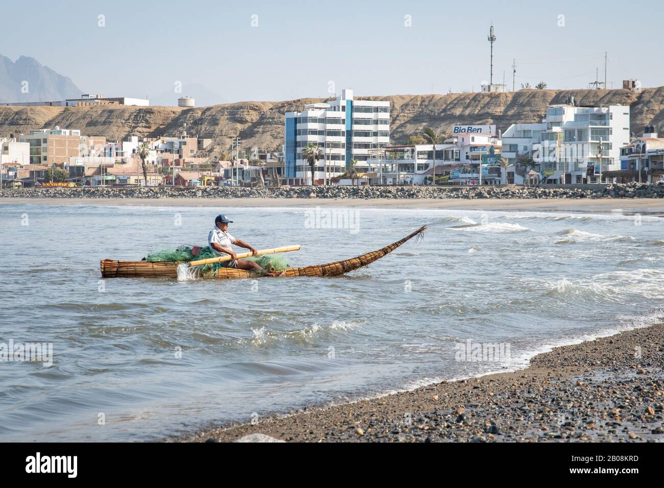 Local fisherman on the traditional canoe made from rushes, the ...