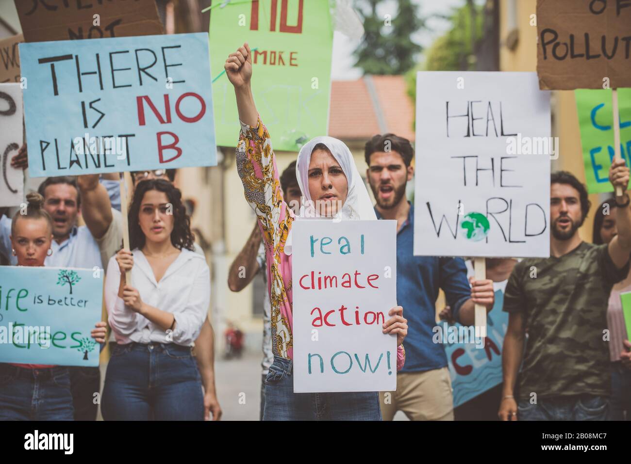 Public demonstration on the street against global warming and pollution ...
