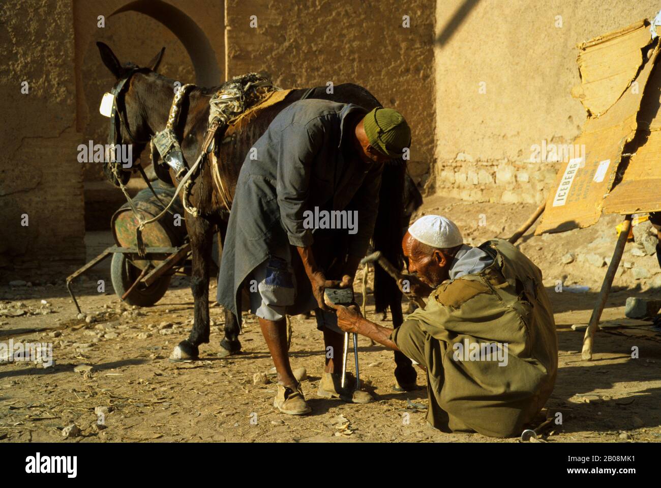 MOROCCO, MARRAKESH, MEDINA (OLD TOWN), STREET SCENE WITH TWO MEN ...