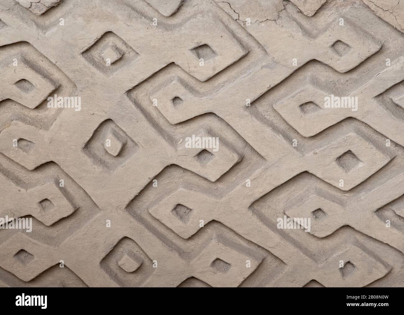 Carvings and reliefs from the pre-Incan Chimu culture in the adobe ...