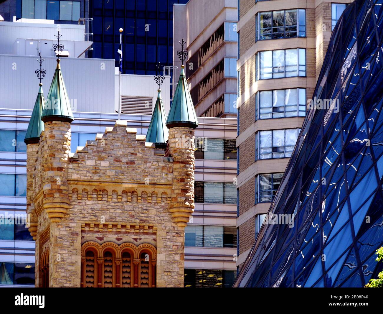Toronto architectural photo. Stone church tower in downtown Toronto ...