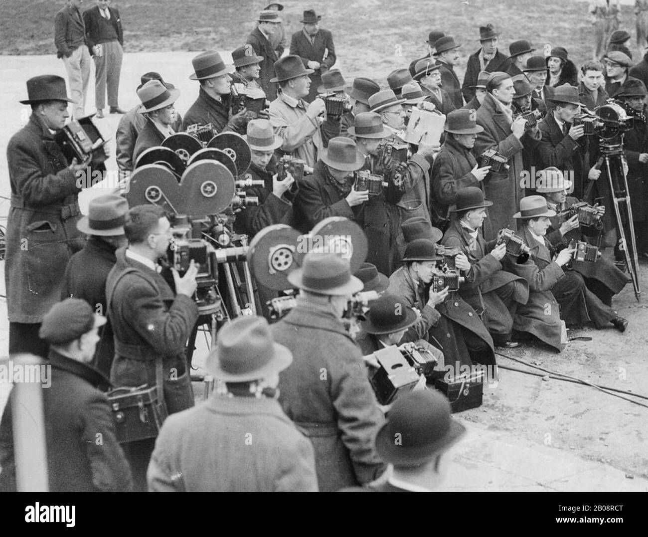 MEDIA SCRUM at Heston Airport, London, awaiting the arfrival of ...