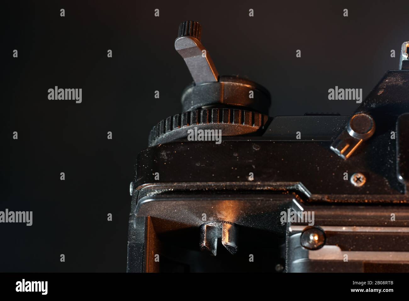 Small crank for film transport photographed on an old camera in the ...