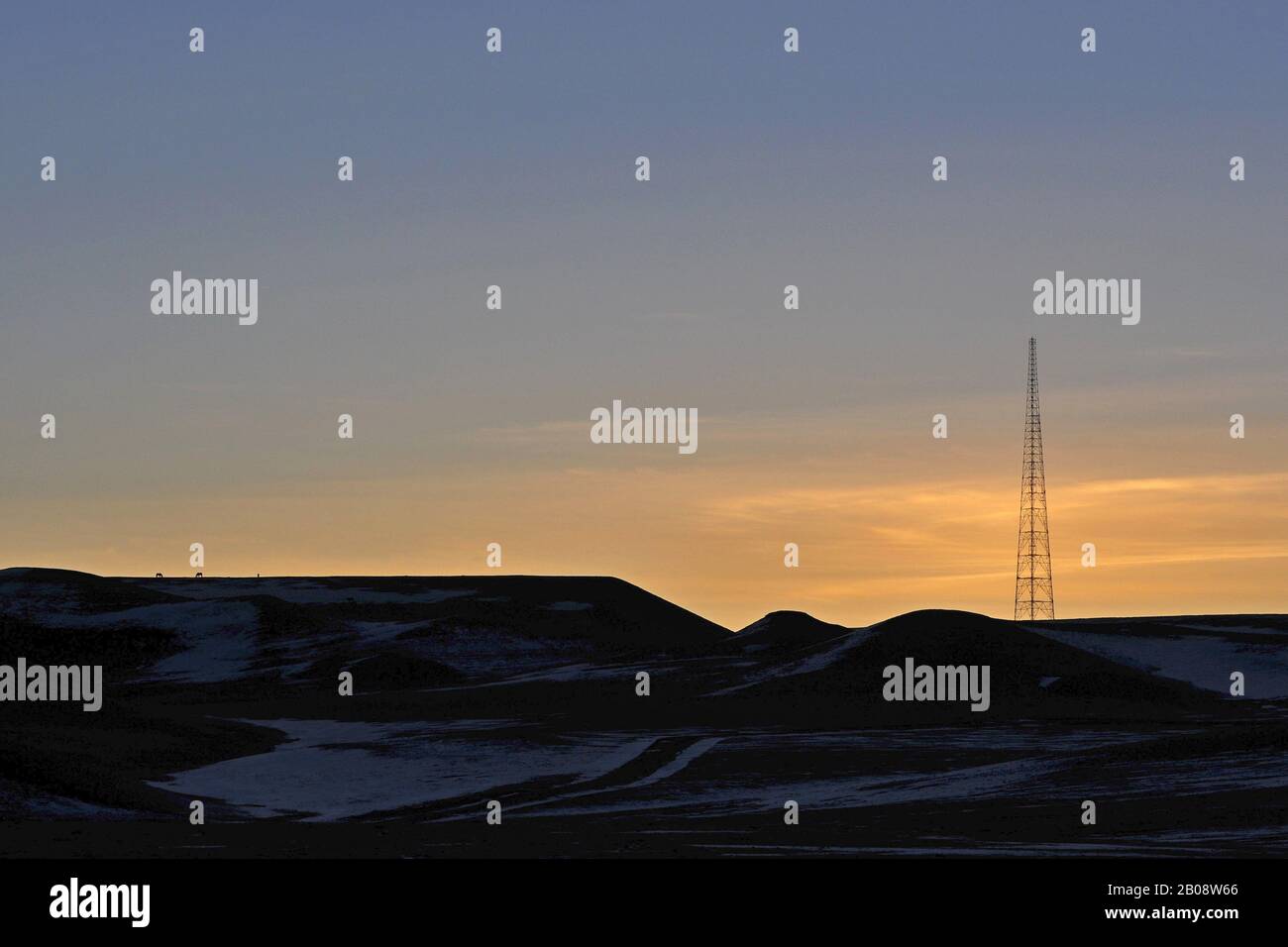 Communications tower at sunset Stock Photo - Alamy