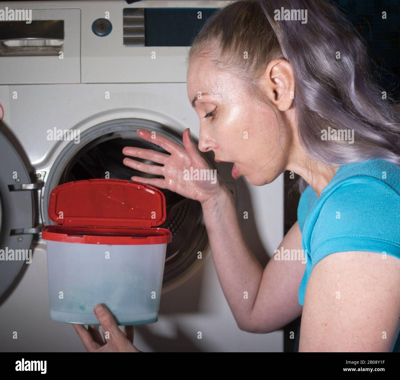 Liquid in washing machine drum hi-res stock photography and images - Alamy