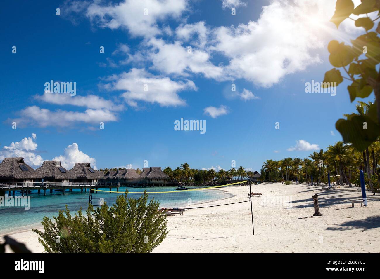 Typical Polynesian landscape - seacoast with palm trees and small ...