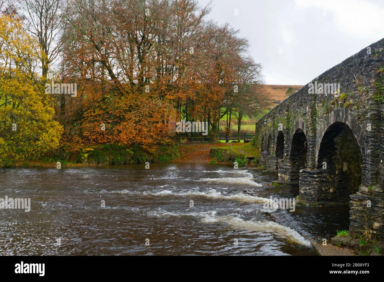 Autumnal picture of New Bridge in the centre of Withypool where it ...