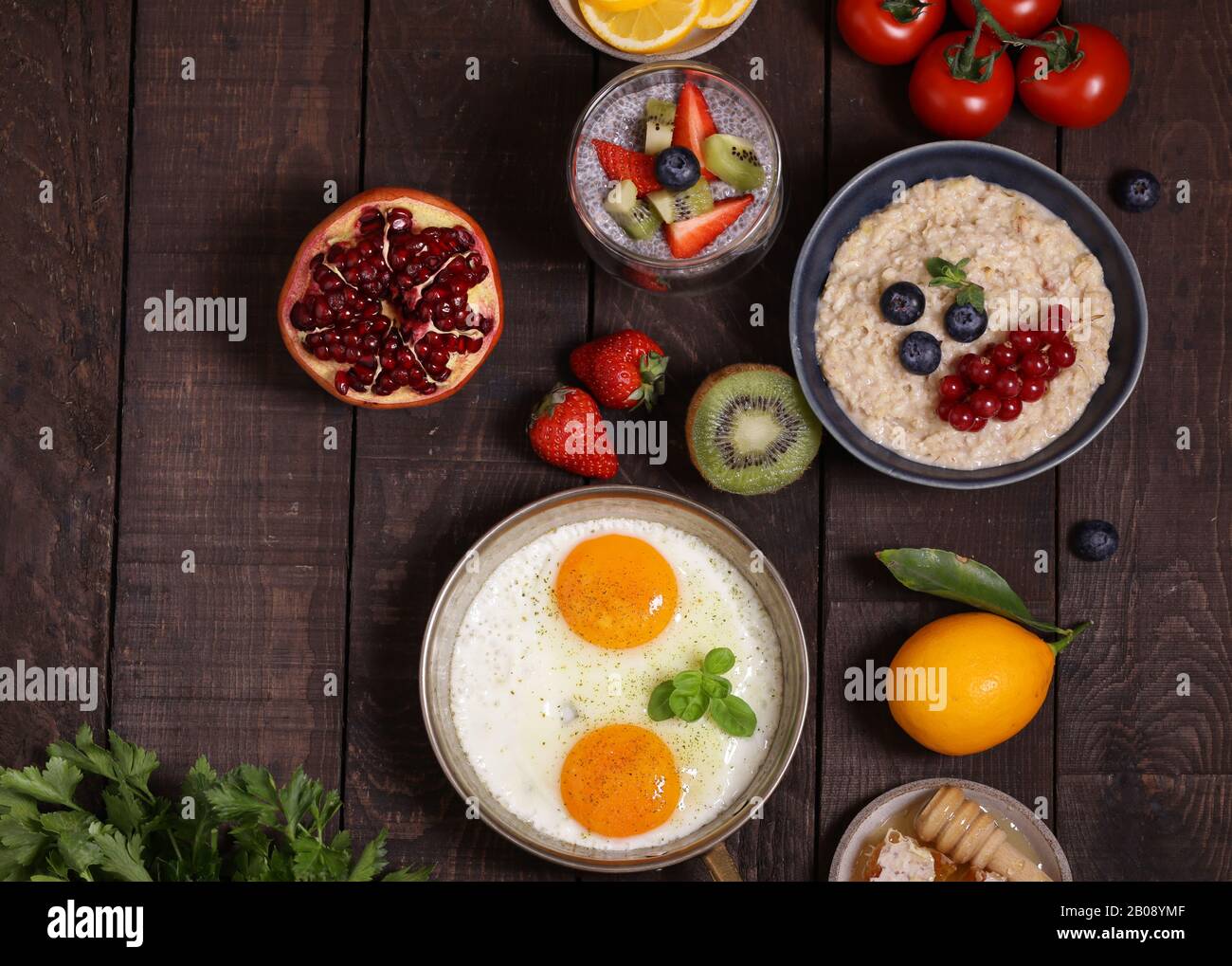 breakfast assortment porridge, fried eggs, chia pudding Stock Photo - Alamy