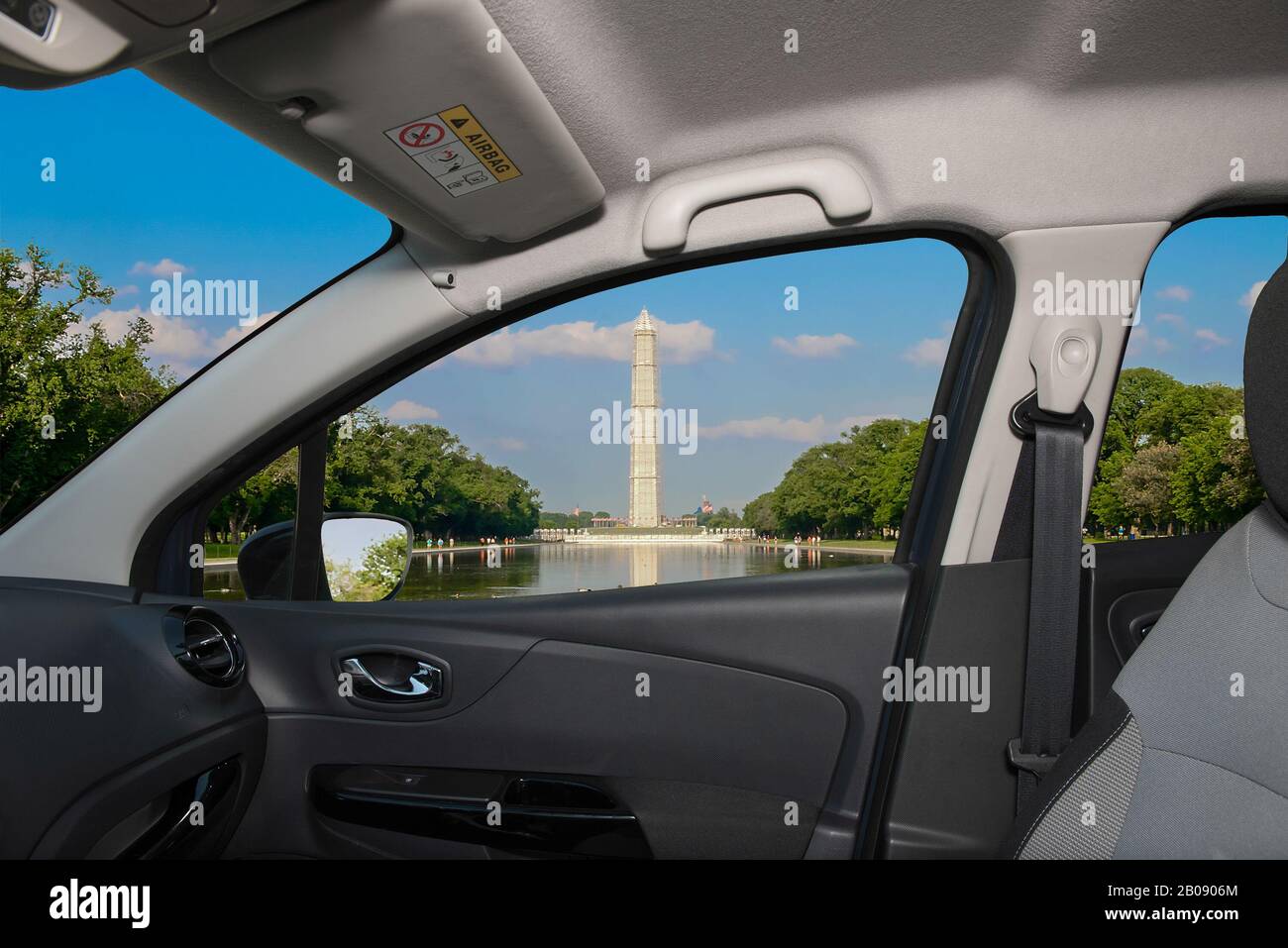 Looking through a car window with view of the Washington Monument and ...