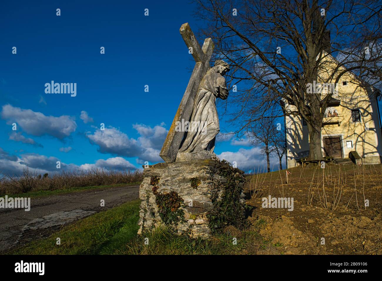 Stone statue of the suffering Jesus Stock Photo - Alamy
