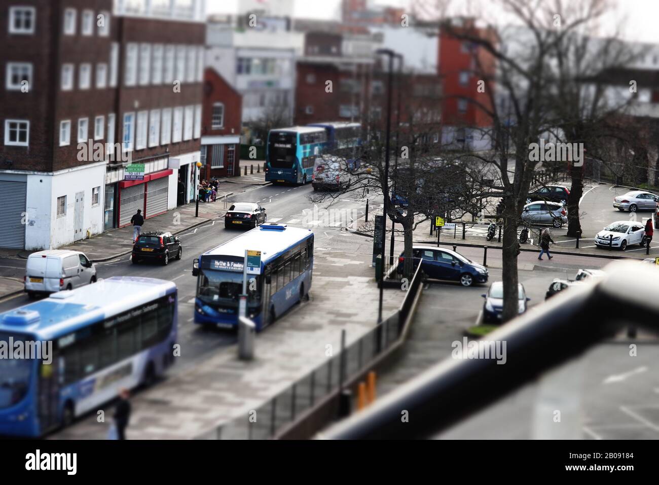 Buses on a busy street Stock Photo - Alamy