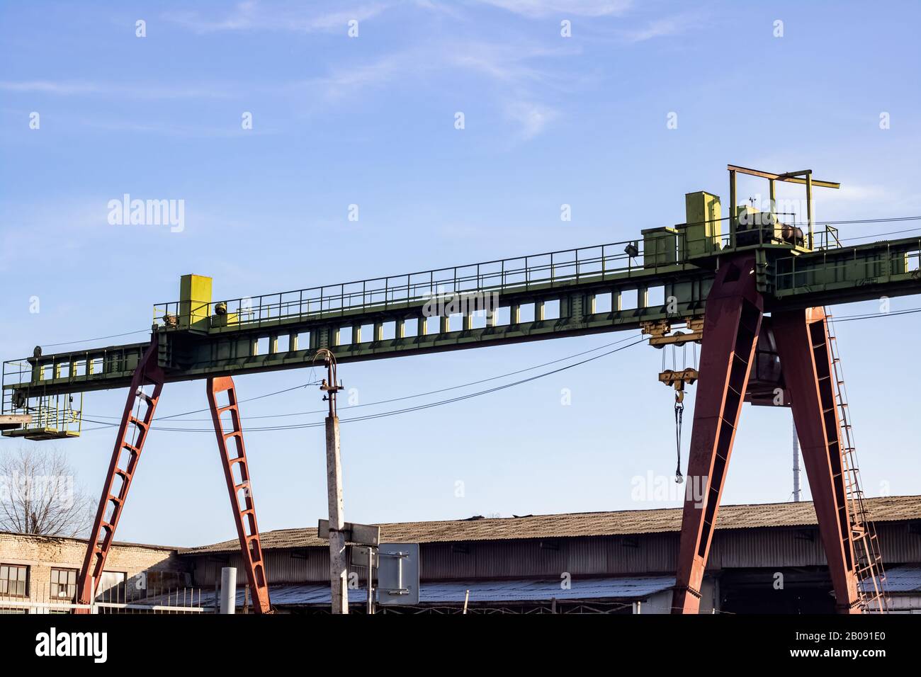 Rail gantry container crane on white background Stock Photo - Alamy
