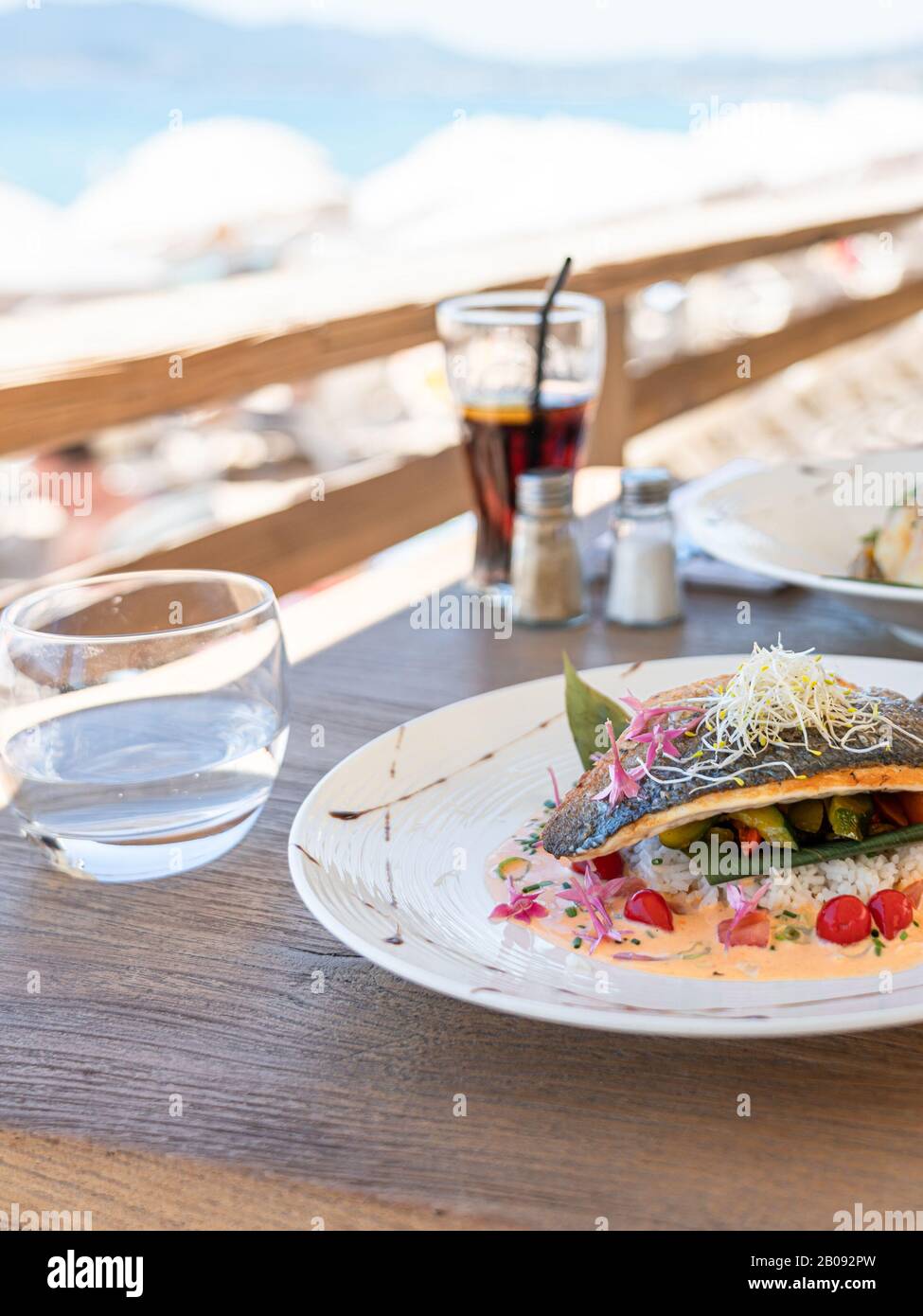 Sea Bream Fish On Restaurant Table Near The Beach Stock Photo - Alamy