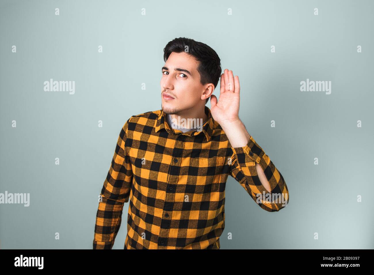information is key to success. portrait of young man with gesture of ...