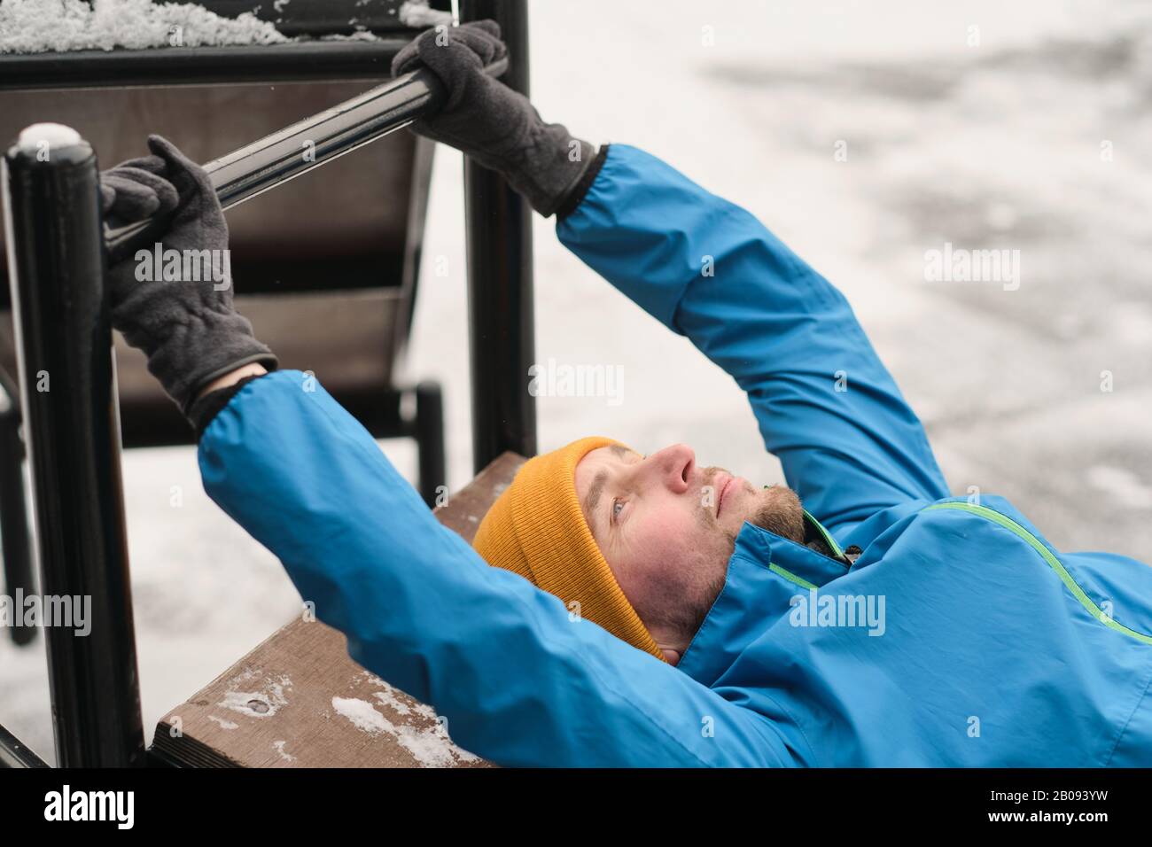 Young man lying on work bench hi-res stock photography and images - Alamy