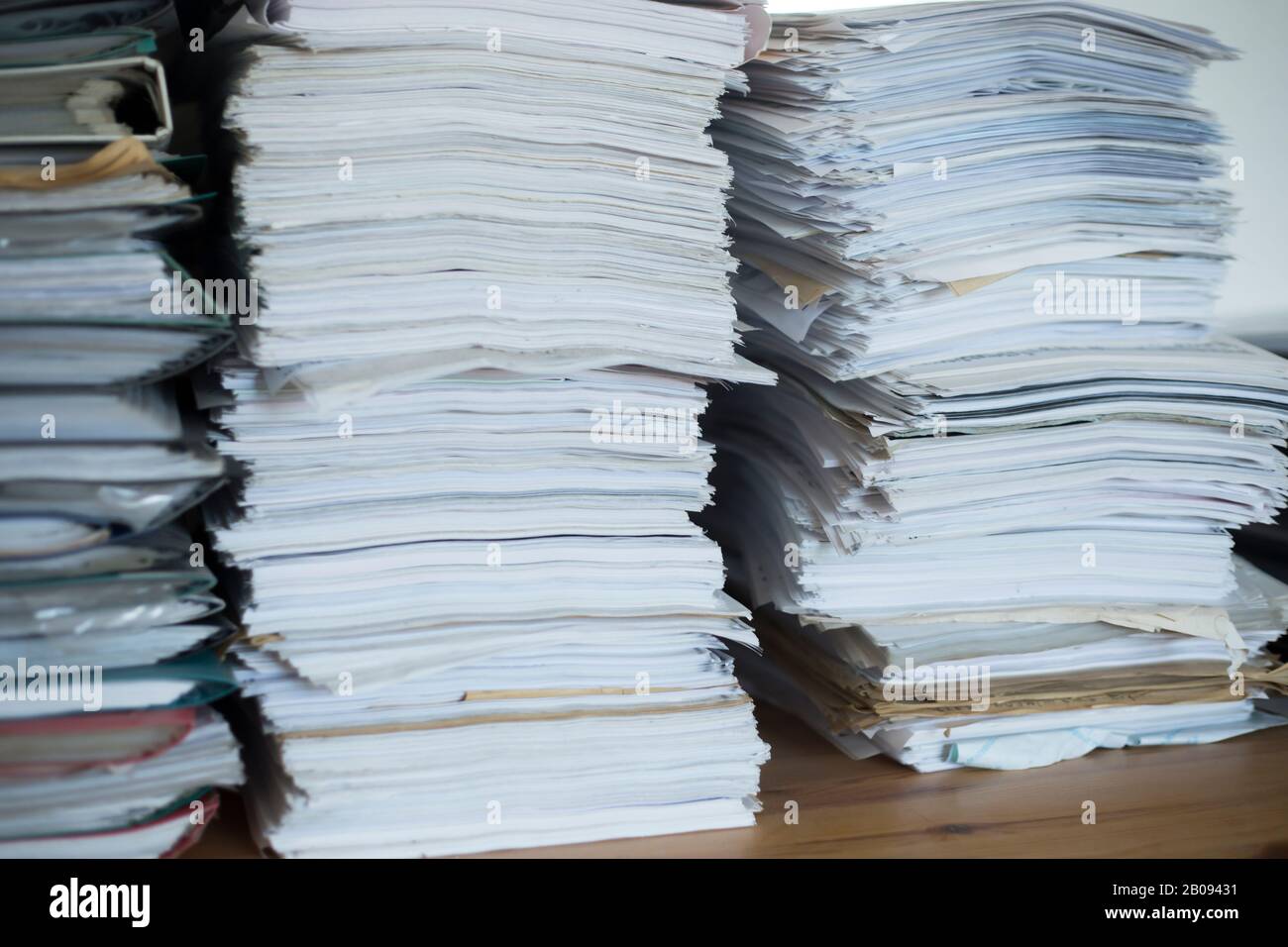 Stack of reporting paper documents Stock Photo - Alamy