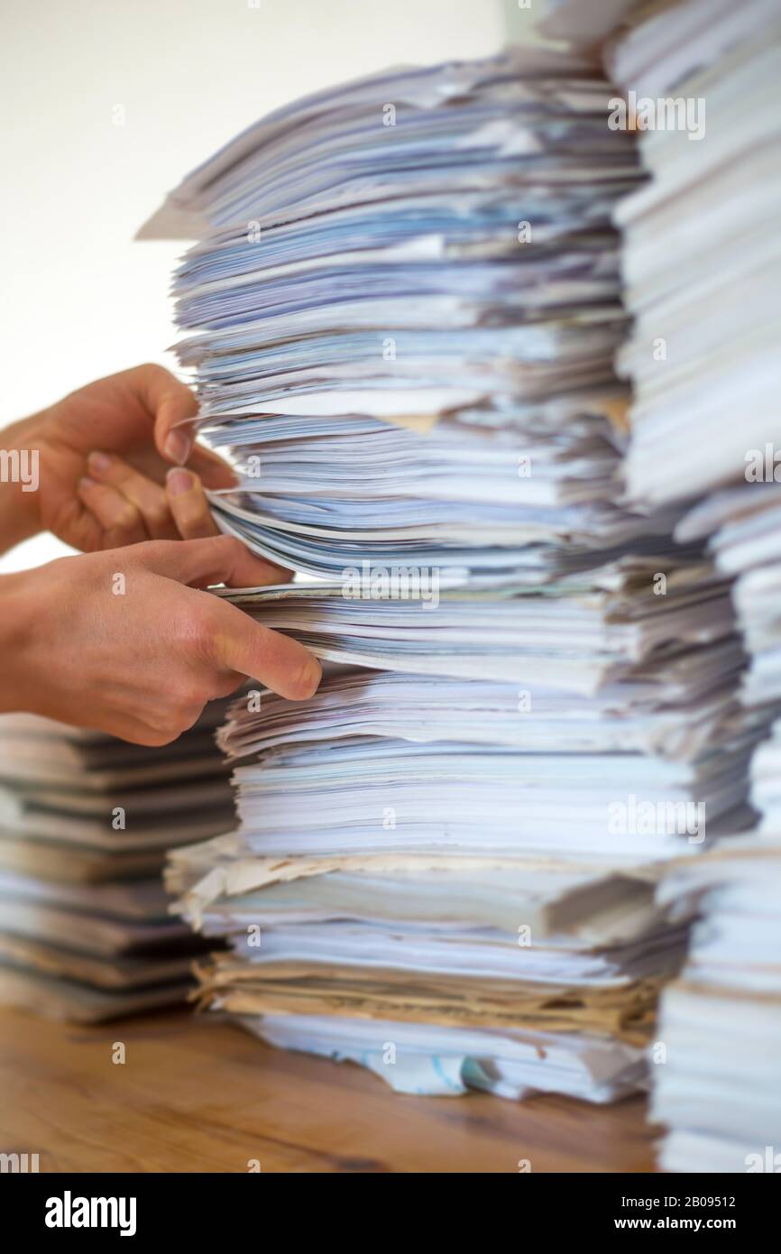 Stack of reporting paper documents Stock Photo - Alamy