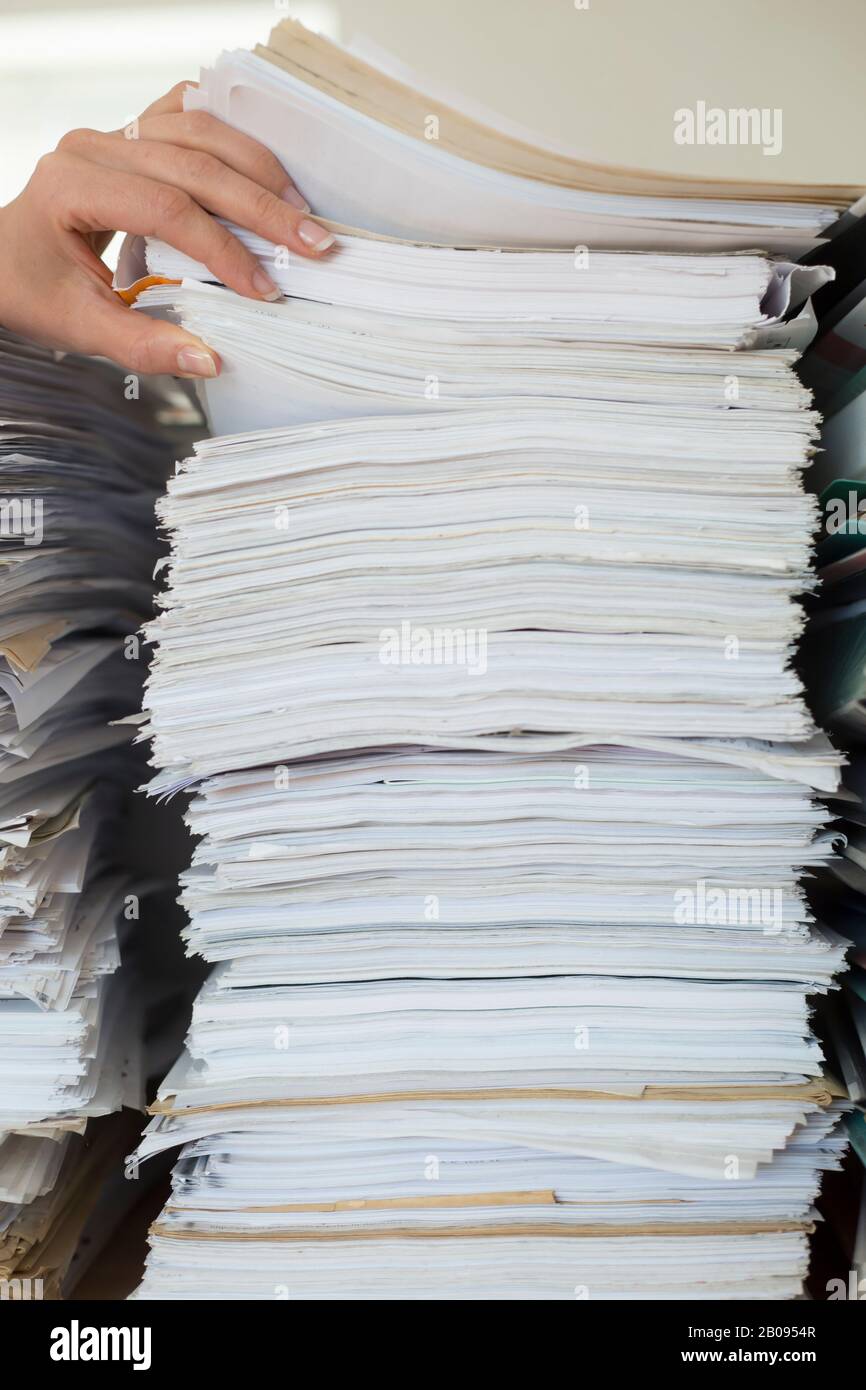 Stack of reporting paper documents Stock Photo - Alamy