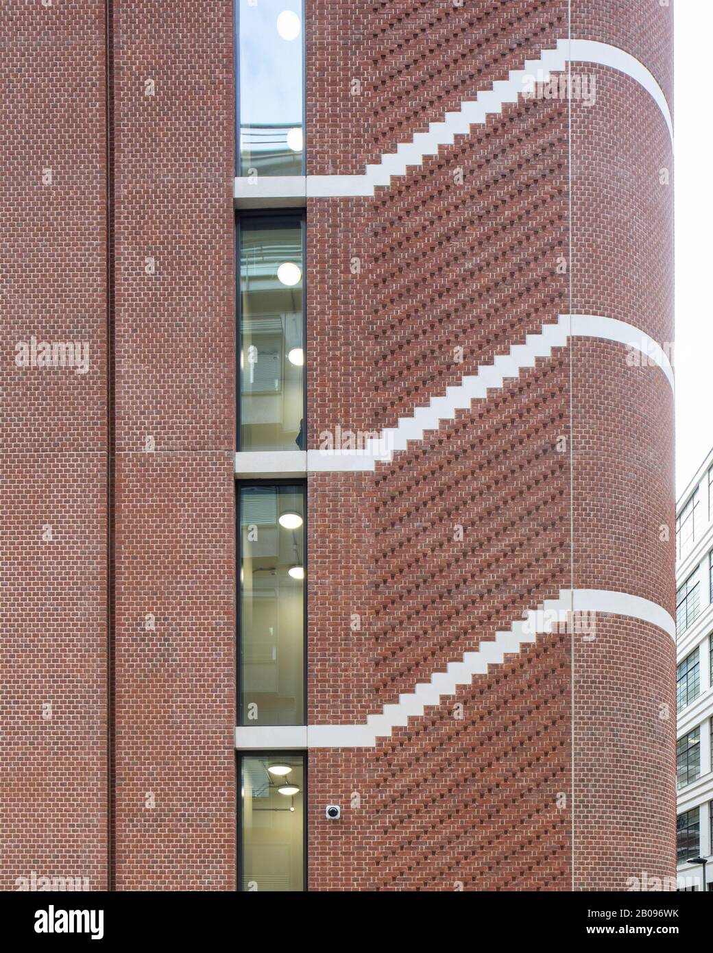 Detail view of curved brick corner. UCLH Eye Hospital, London, United ...