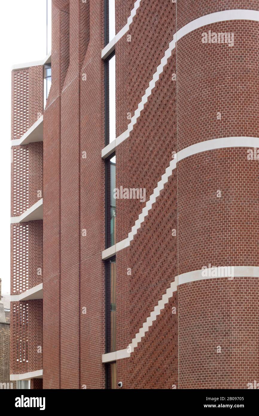 Detail view of curved brick corner. UCLH Eye Hospital, London, United ...