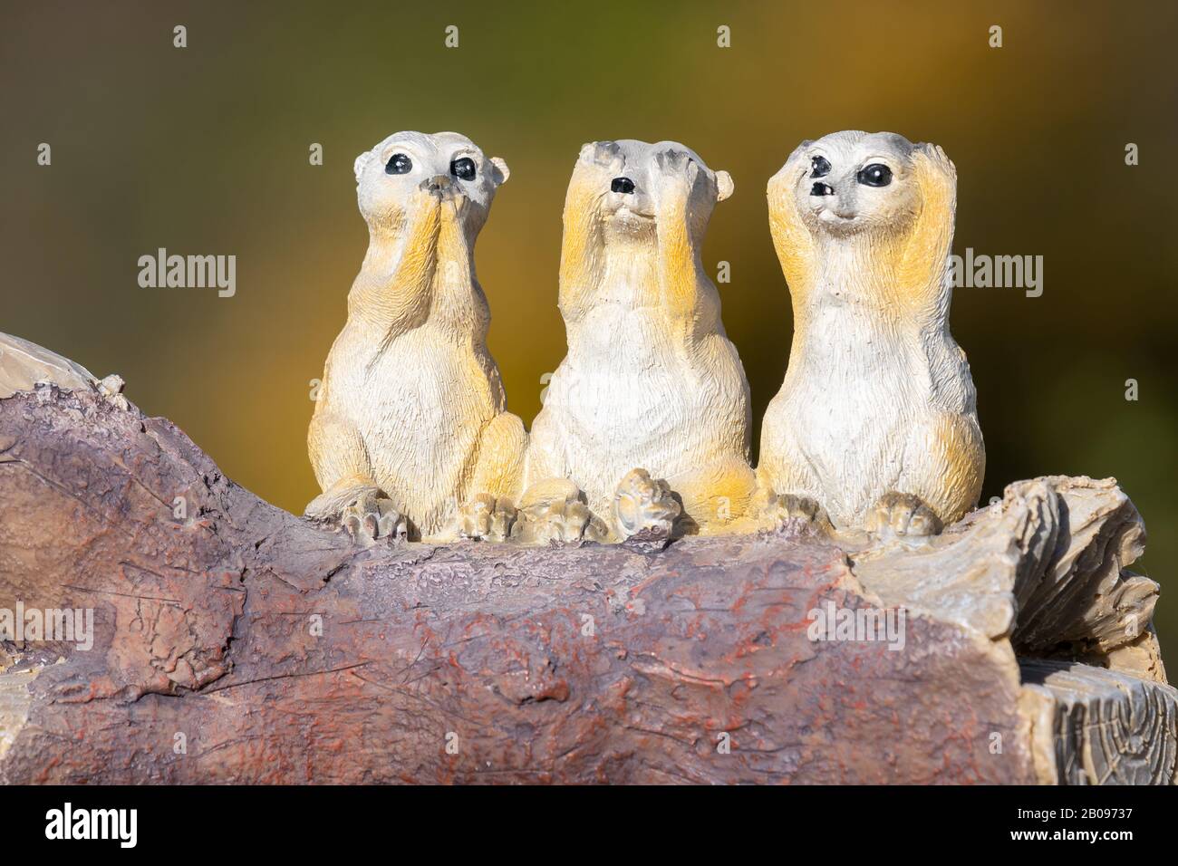 Close up of an ornament of three meerkats depicting the proverb hear no ...