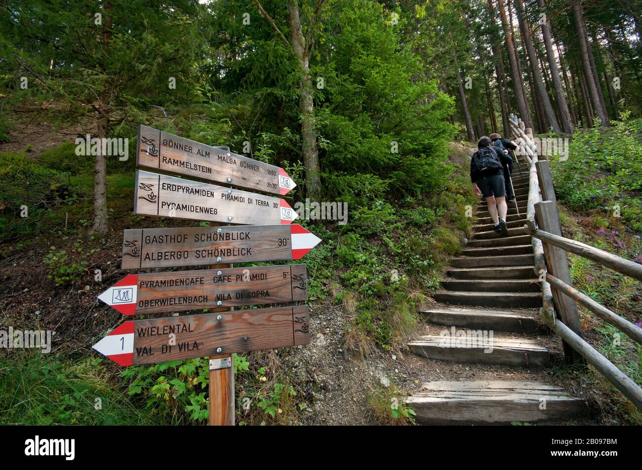 Wooden path signs at start of trail to Piramidi di terra di Perca ...