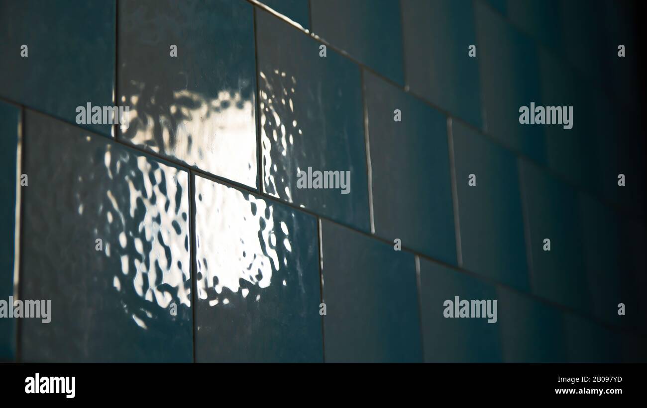 Bath room tiles reflection scene Stock Photo - Alamy