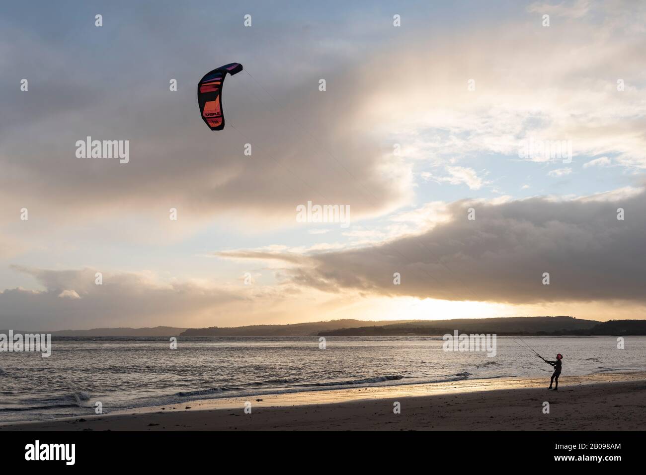 Kite Surfers on the Beach at Exmouth Stock Photo - Alamy