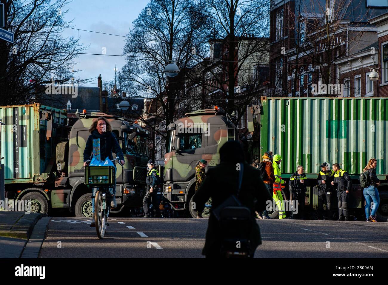 Military vehicles block some parts of the city during the protest ...