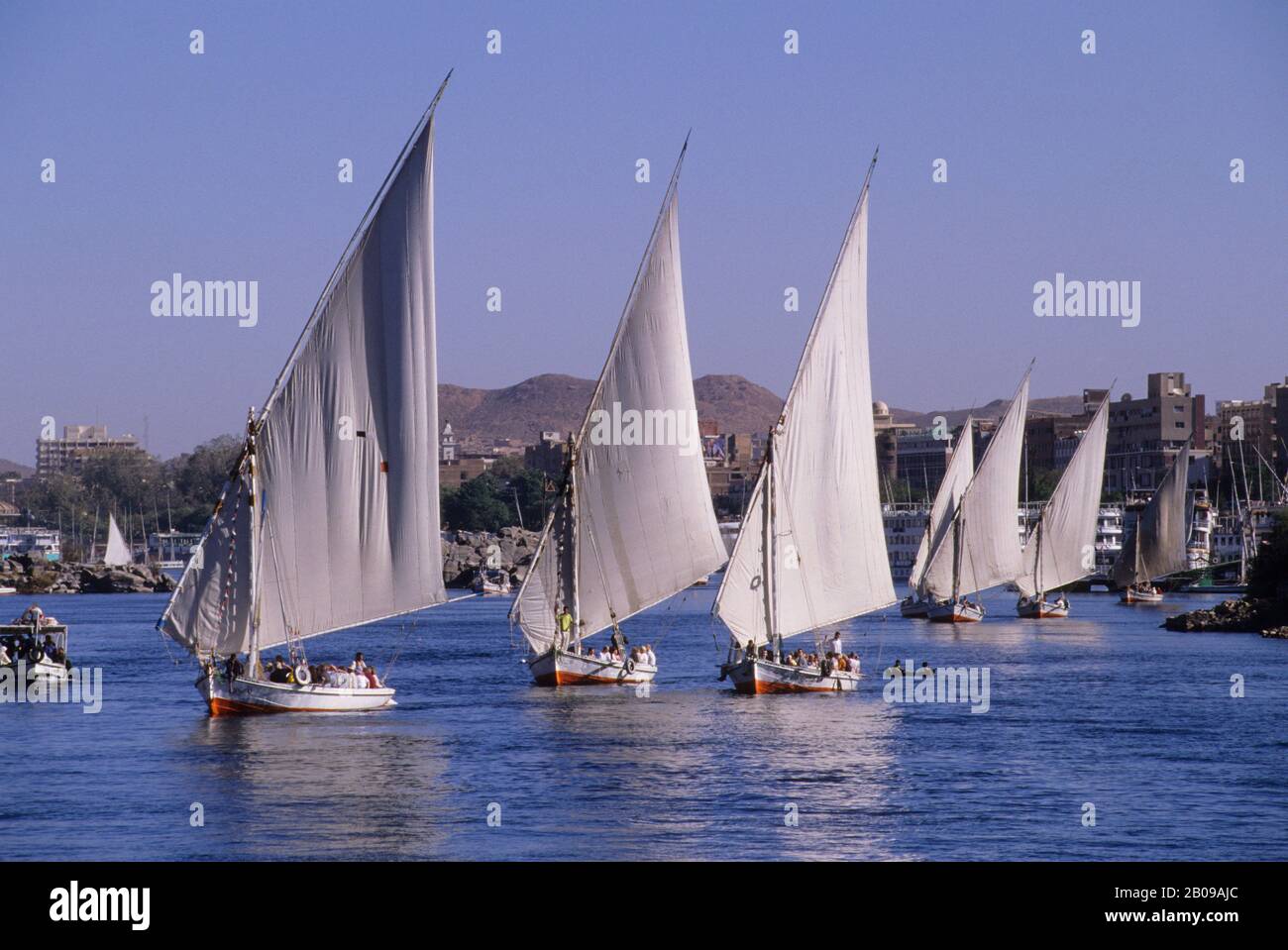 EGYPT, ASWAN, NILE RIVER, FELUCCAS WITH TOURISTS Stock Photo - Alamy